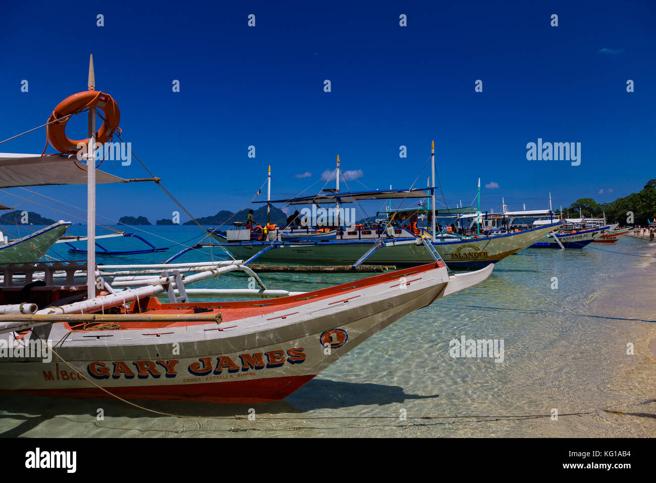 Asia Philippines Palawan El Nido Tour boats on Seven Commando Beach ...