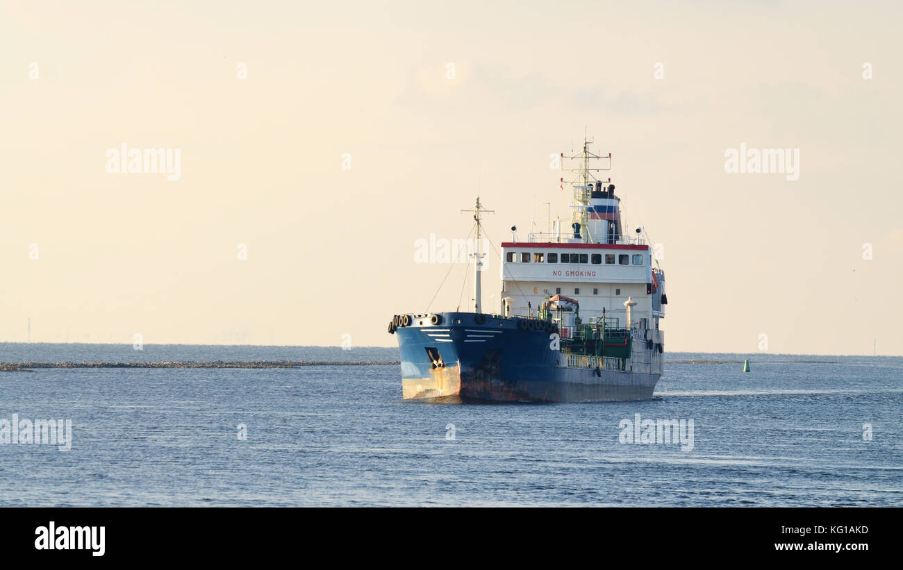 On the horizon the sea is visible floating tanker Stock Photo - Alamy