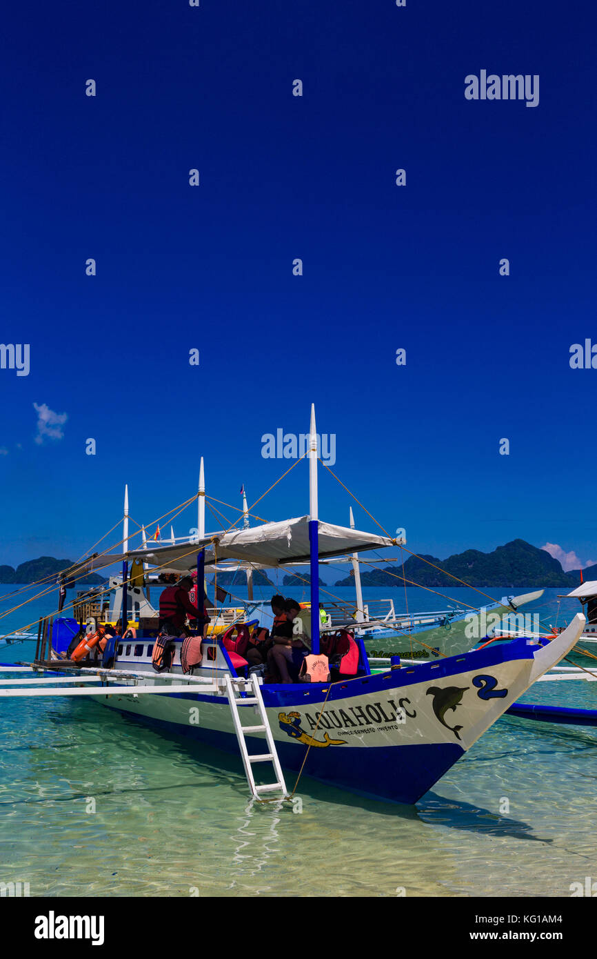 Asia Philippines Palawan El Nido Tour boats on Seven Commando Beach ...