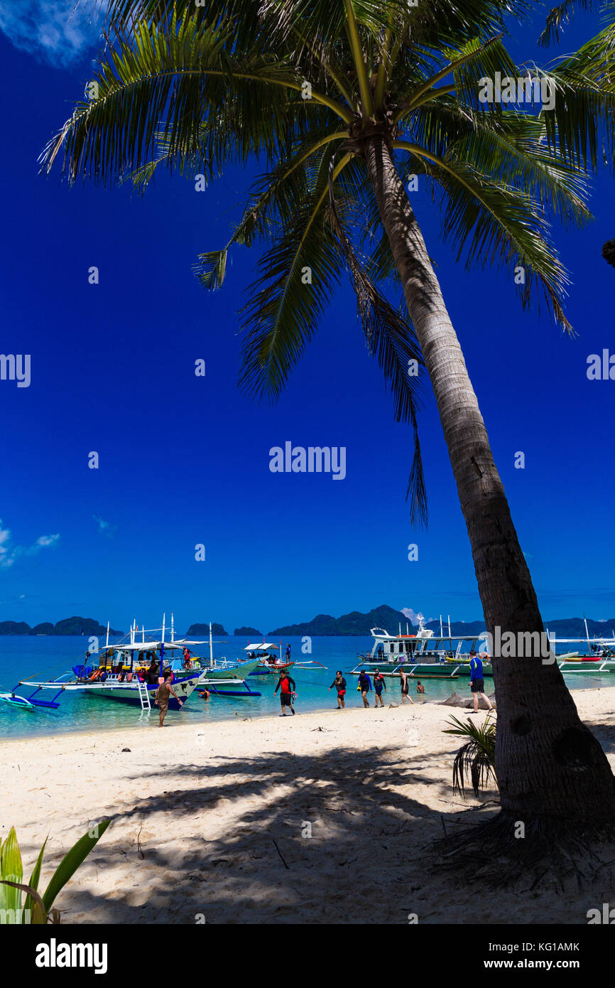 Asia Philippines Palawan El Nido Tour boats on Seven Commando Beach ...