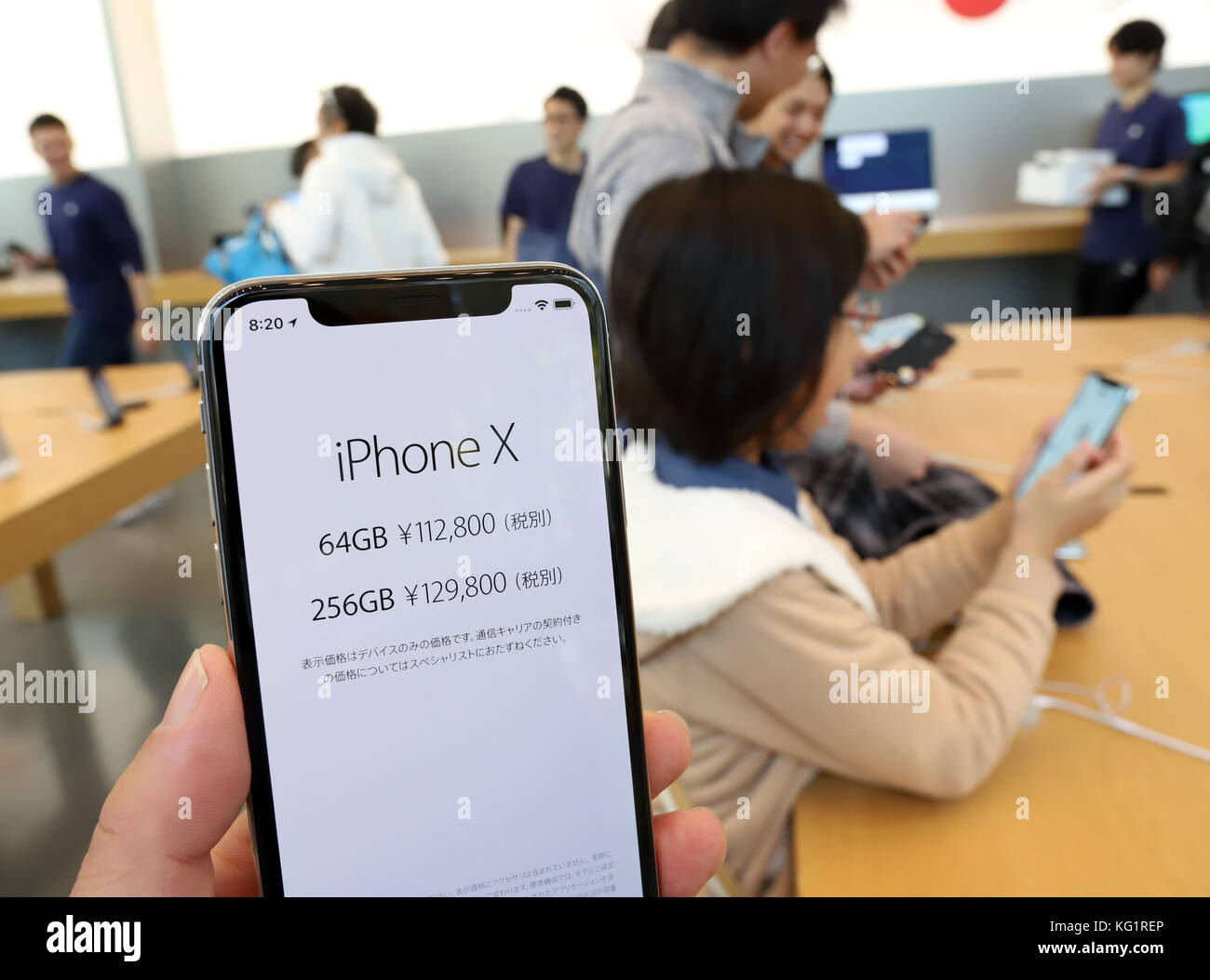 Tokyo, Japan. 3rd Nov, 2017. Customers check newly released iPhone X at ...