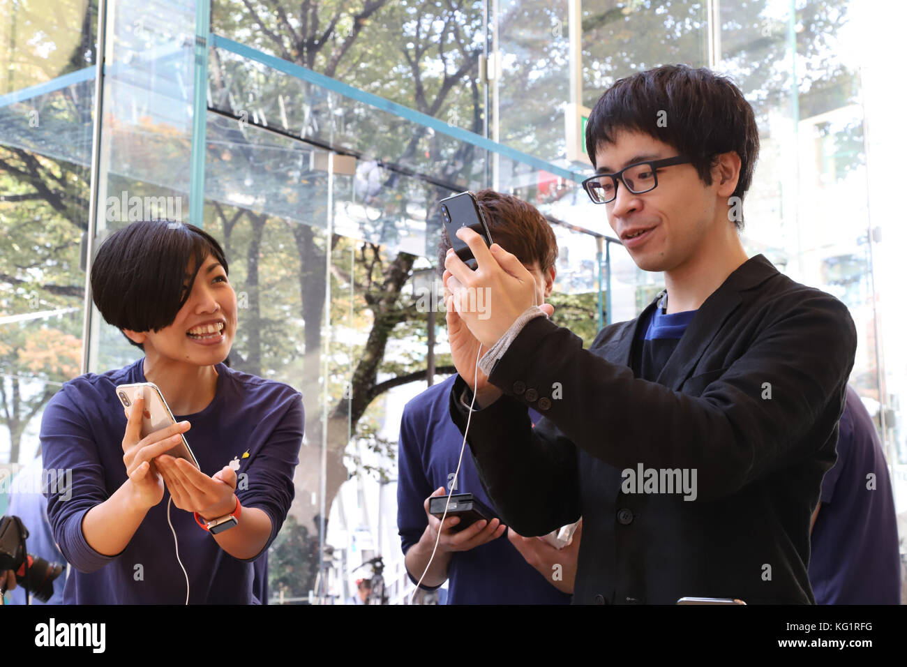 Tokyo, Japan. 3rd Nov, 2017. Customers check newly released iPhone X at ...