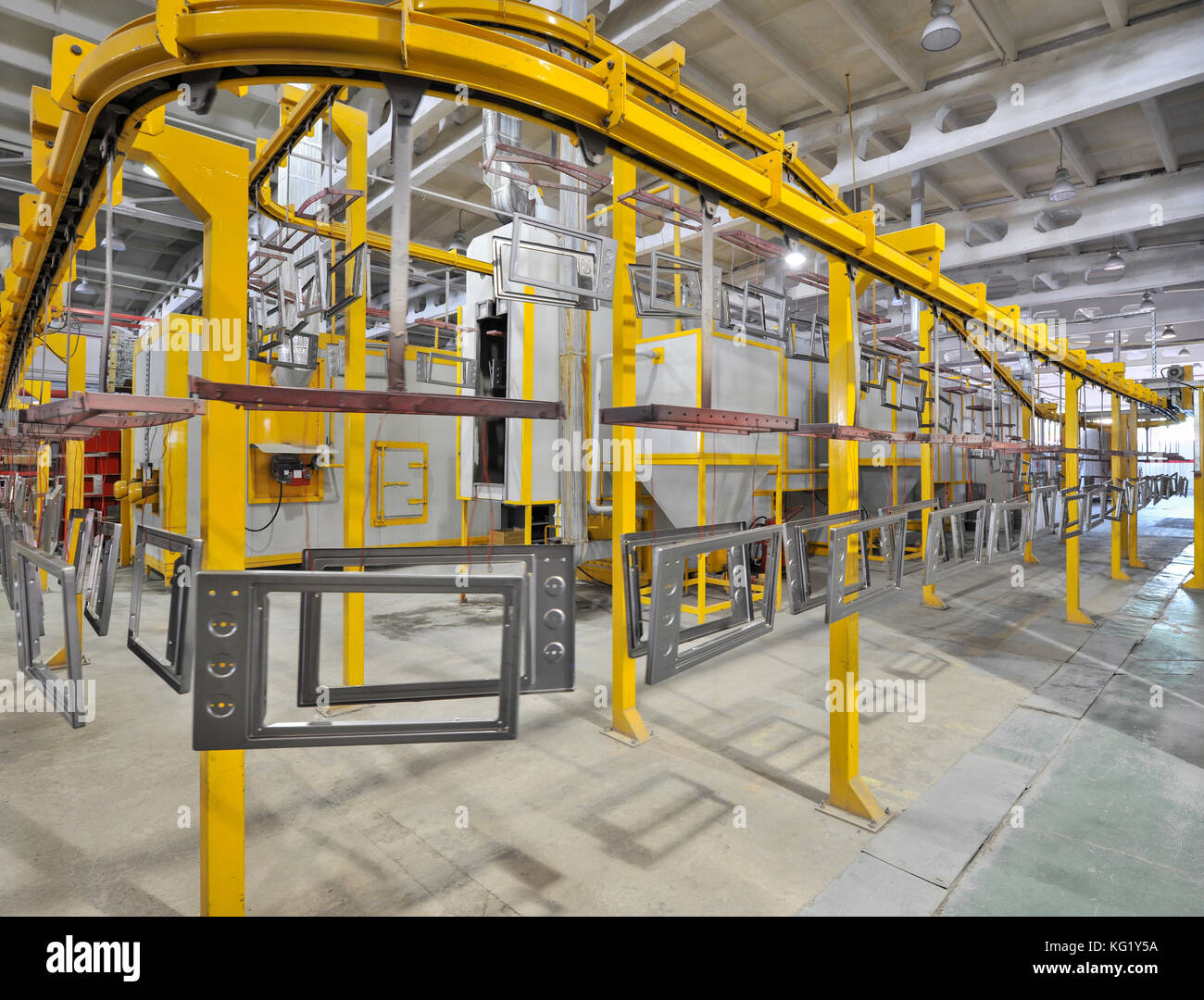 industrial workshop for the assembly of oven on a conveyor belt Stock ...
