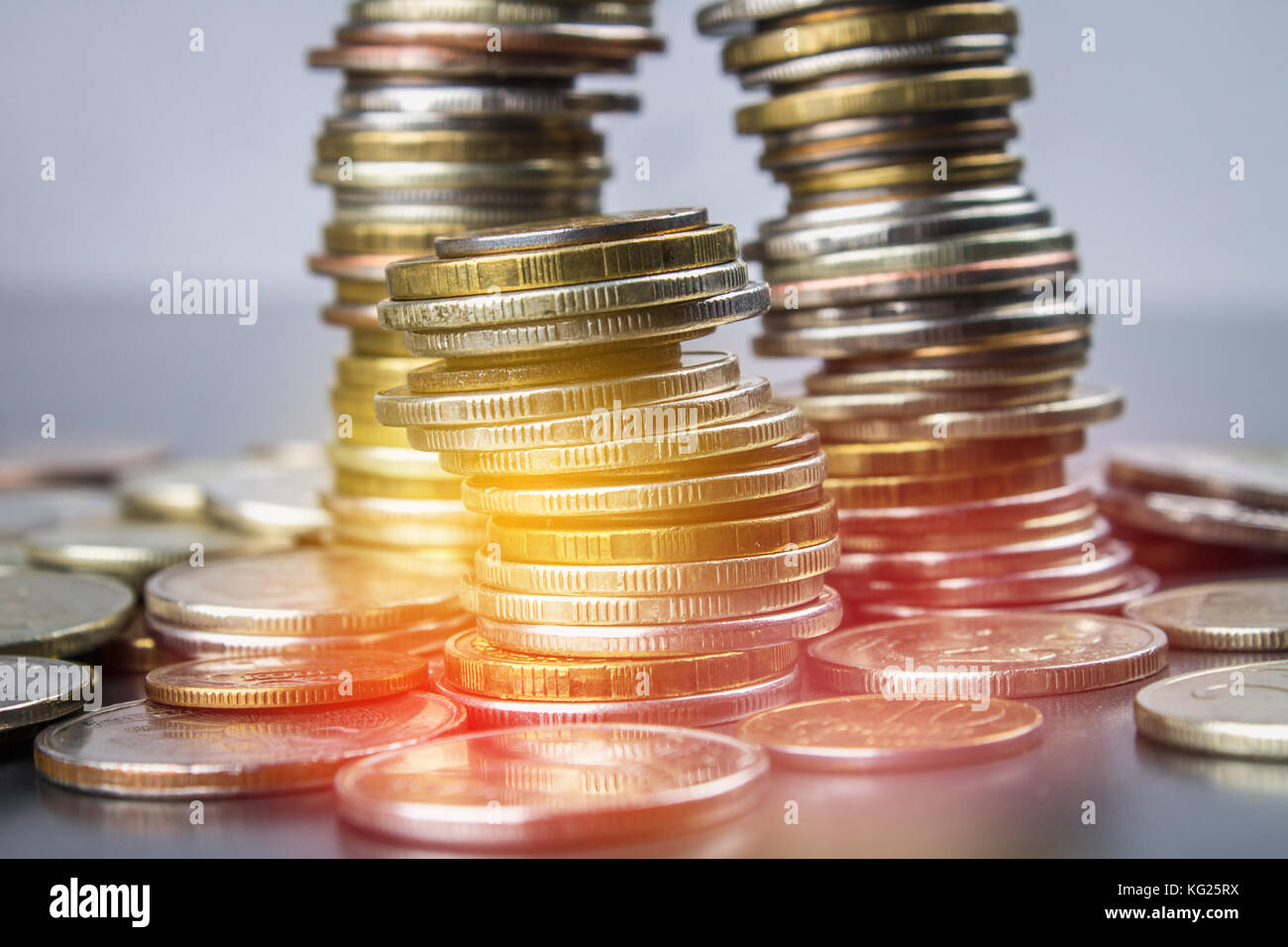 Stacks of Russian coins on a gray background with droplets of water ...