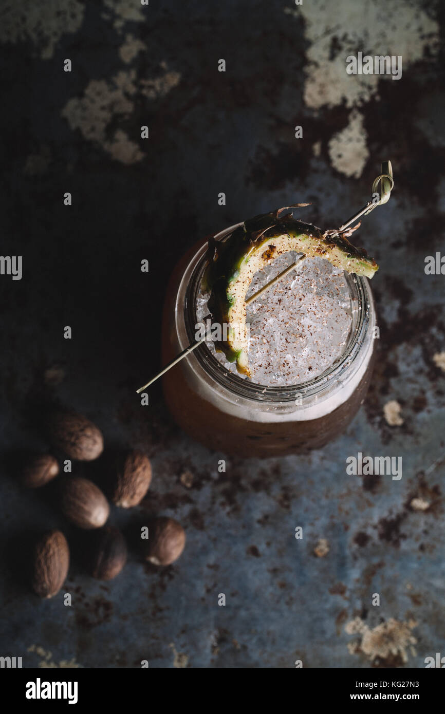 Alcoholic cocktail on a rusty moody background Stock Photo - Alamy