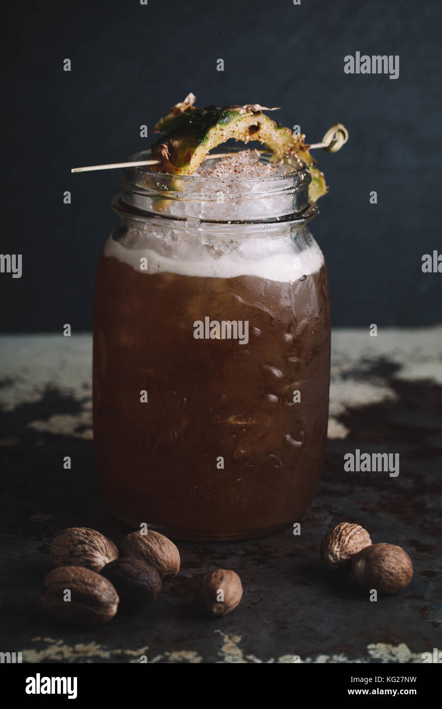 Alcoholic cocktail on a rusty moody background Stock Photo - Alamy