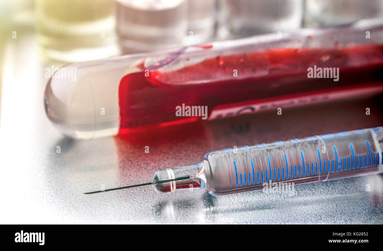 Several Vials And Syringe In Laboratory, Conceptual Image Stock Photo - Alamy