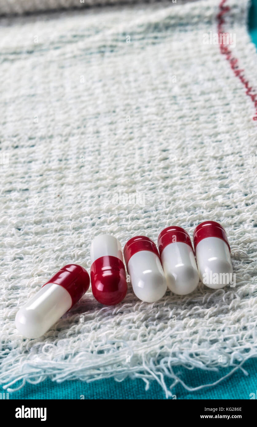 Single red pill white hi-res stock photography and images - Alamy