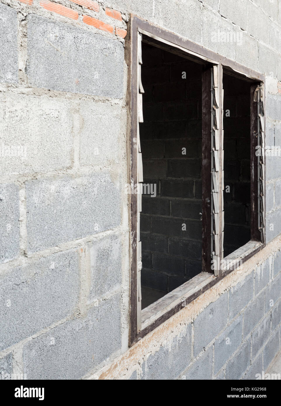 Empty wooden frame on the twin window of the construction house Stock ...