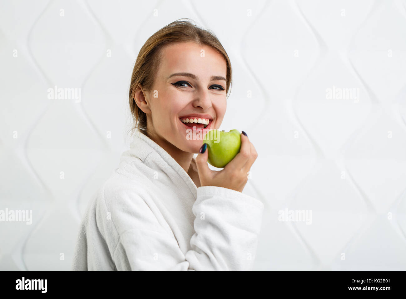 Cheerful Woman Enjoys Apple Stock Photo - Alamy