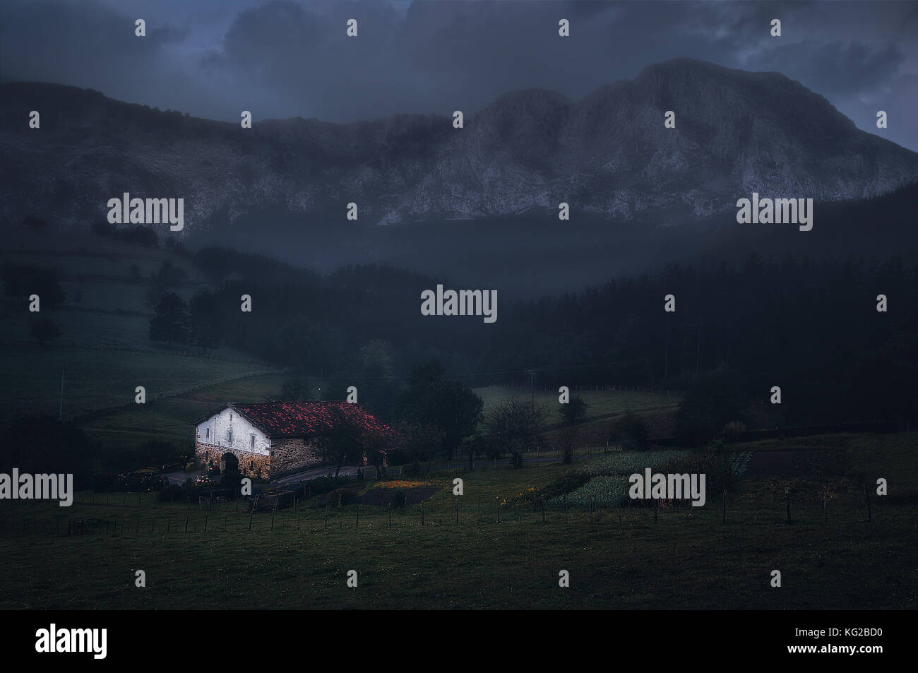 typical basque country house in Axpe surrounding by mountains Stock ...