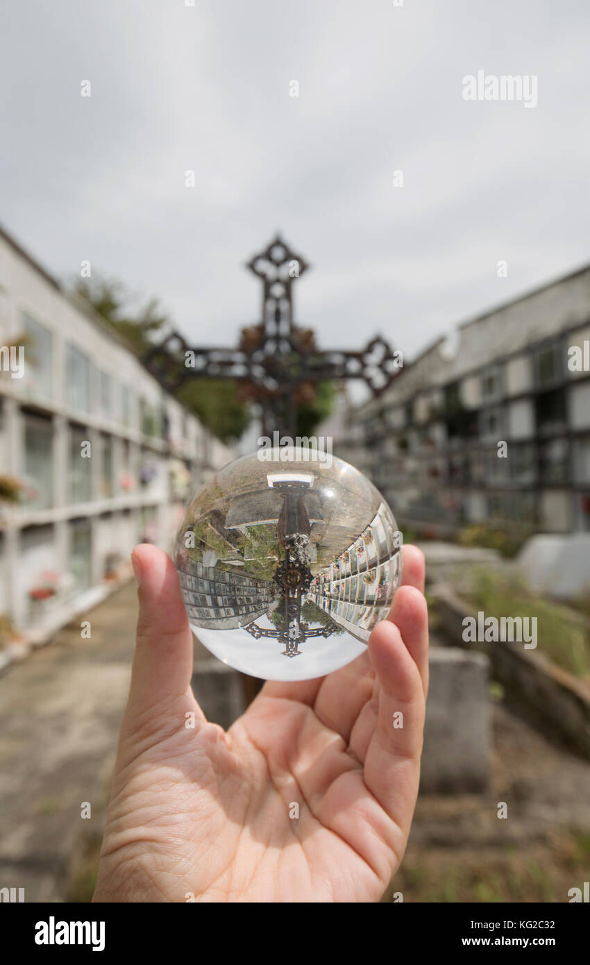 A cross is reflected over a glass ball Stock Photo - Alamy