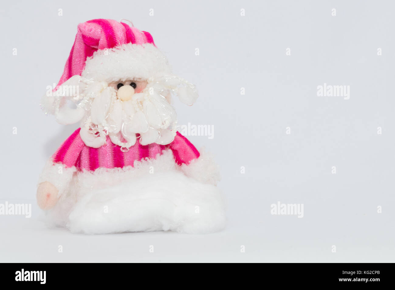 Adorable pink Santa Claus with white background Stock Photo - Alamy