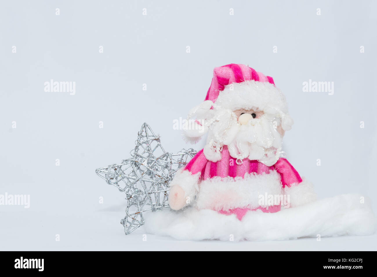 Adorable pink Santa Claus and silver star with white background Stock ...