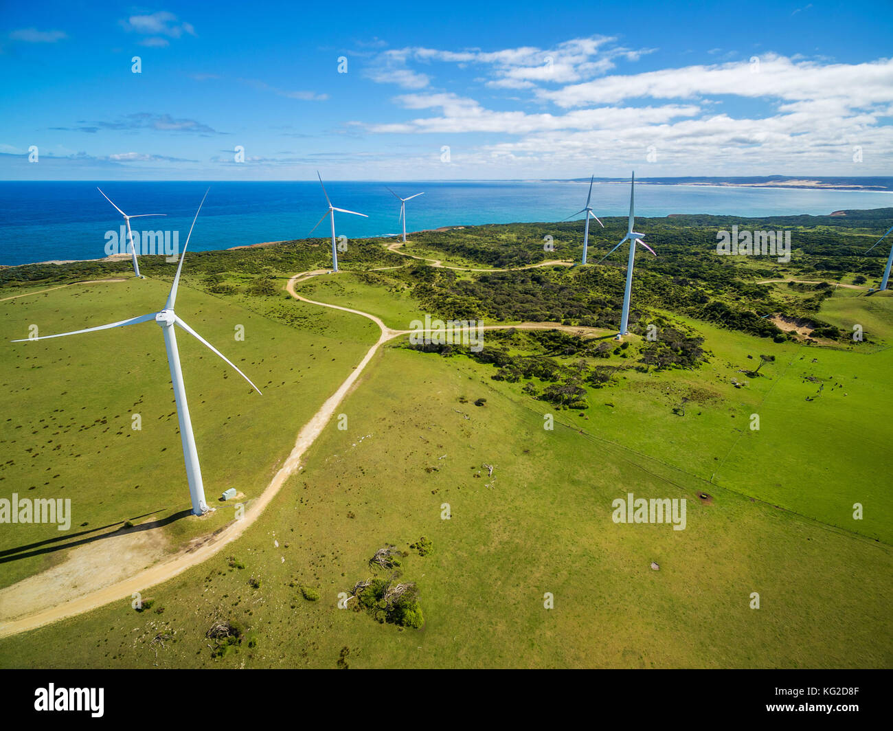 Aerial view of wind farm in rural area on bright sunny day in Australia ...