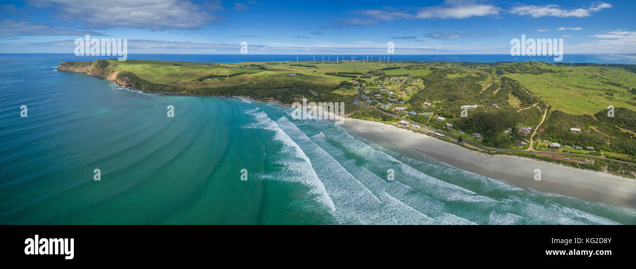 Aerial panorama of Cape Bridgewater beach, settlement, and wind farm in ...
