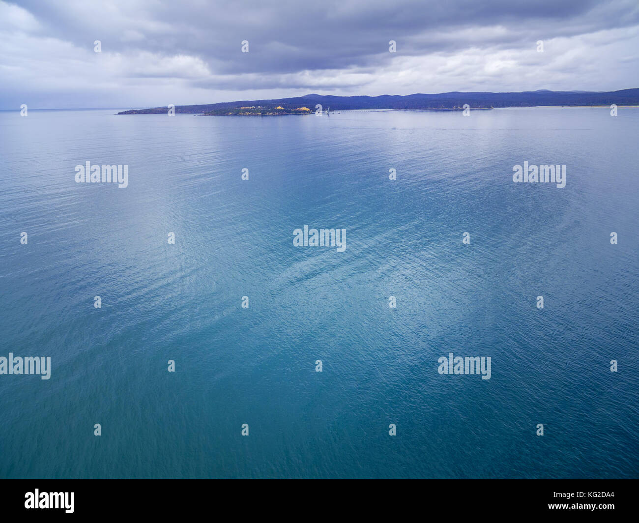 Minimalist aerial landscape - nothing but water, patch of land, and ...