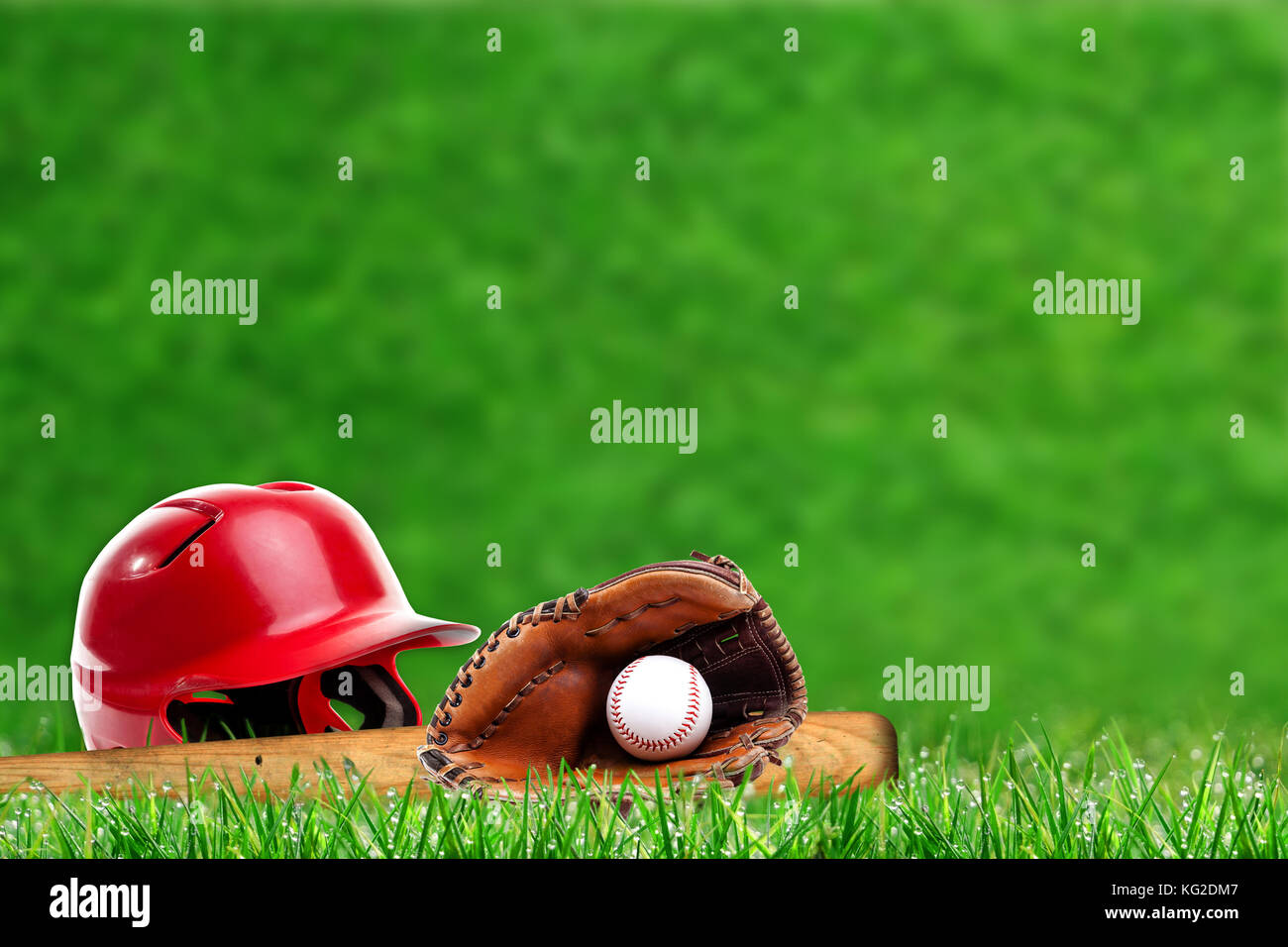 Low angle view of baseball equipment on field with close up dew on ...