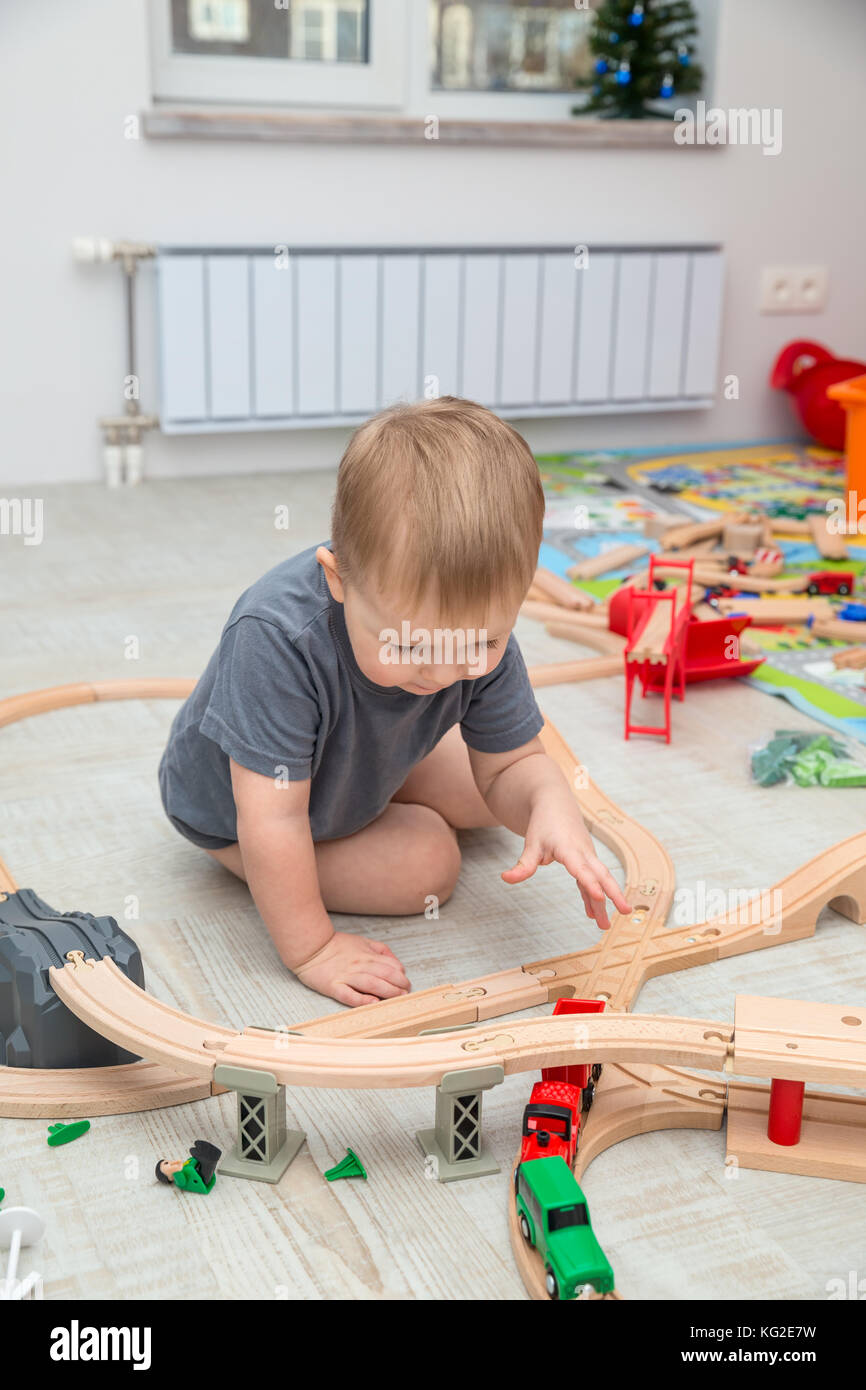 Boy playing with toy train hi-res stock photography and images - Alamy