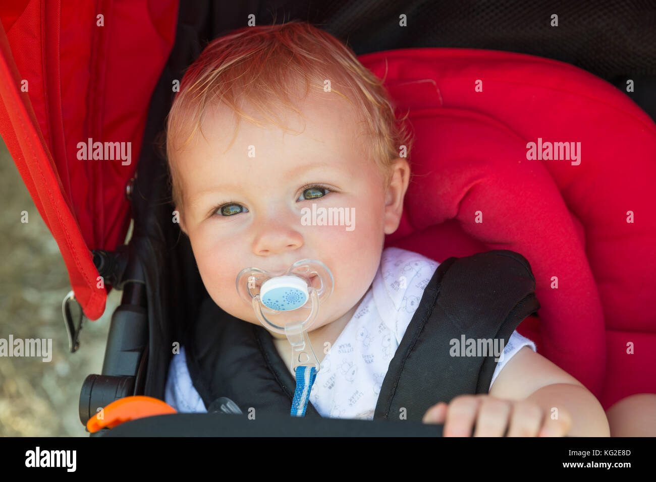 Red pacifier hi-res stock photography and images - Alamy