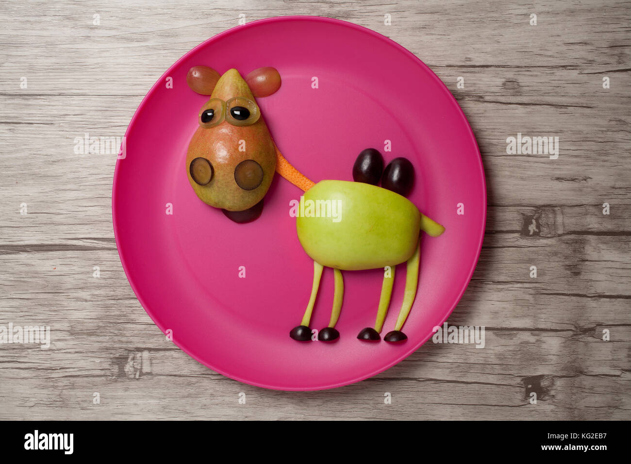 Camel made with fruits on plate and desk Stock Photo - Alamy