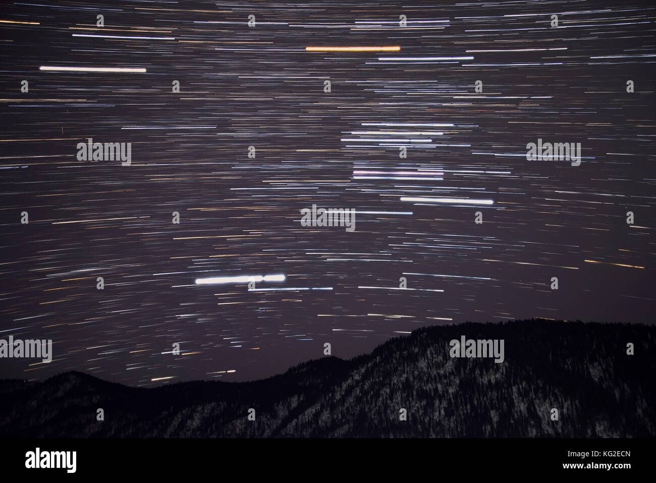 Beautiful night view with traces of stars in the form of tracks in the ...