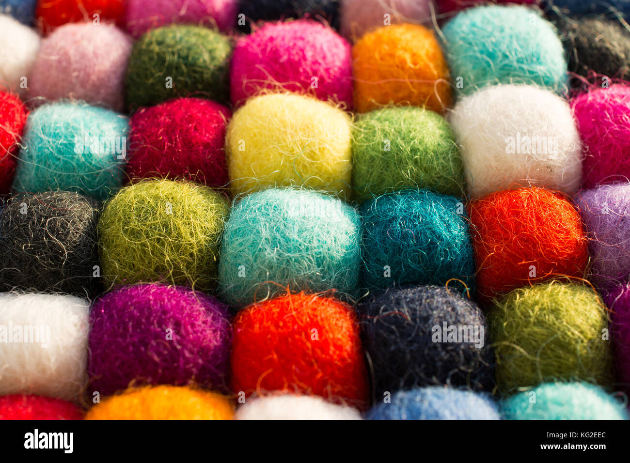 Geometric background with balls of colored synthetic wool Stock Photo ...