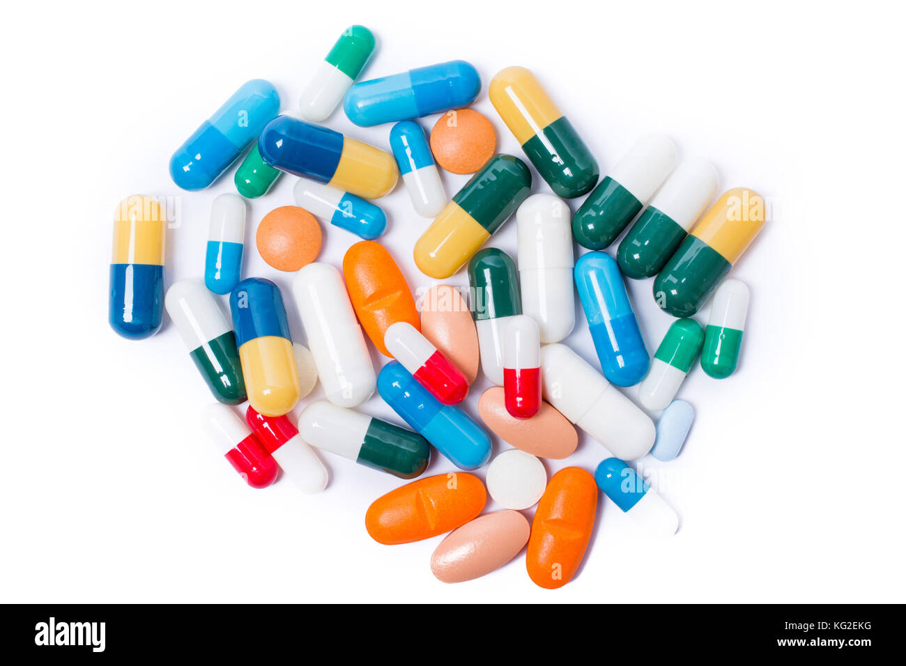 Pharmaceutical medicament, with colored pills and capsule on white ...