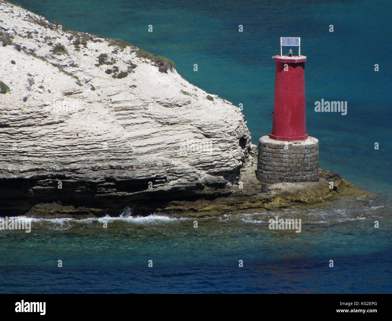 red lighthouse and limestone cliffs, mediterranean sea, view from ...