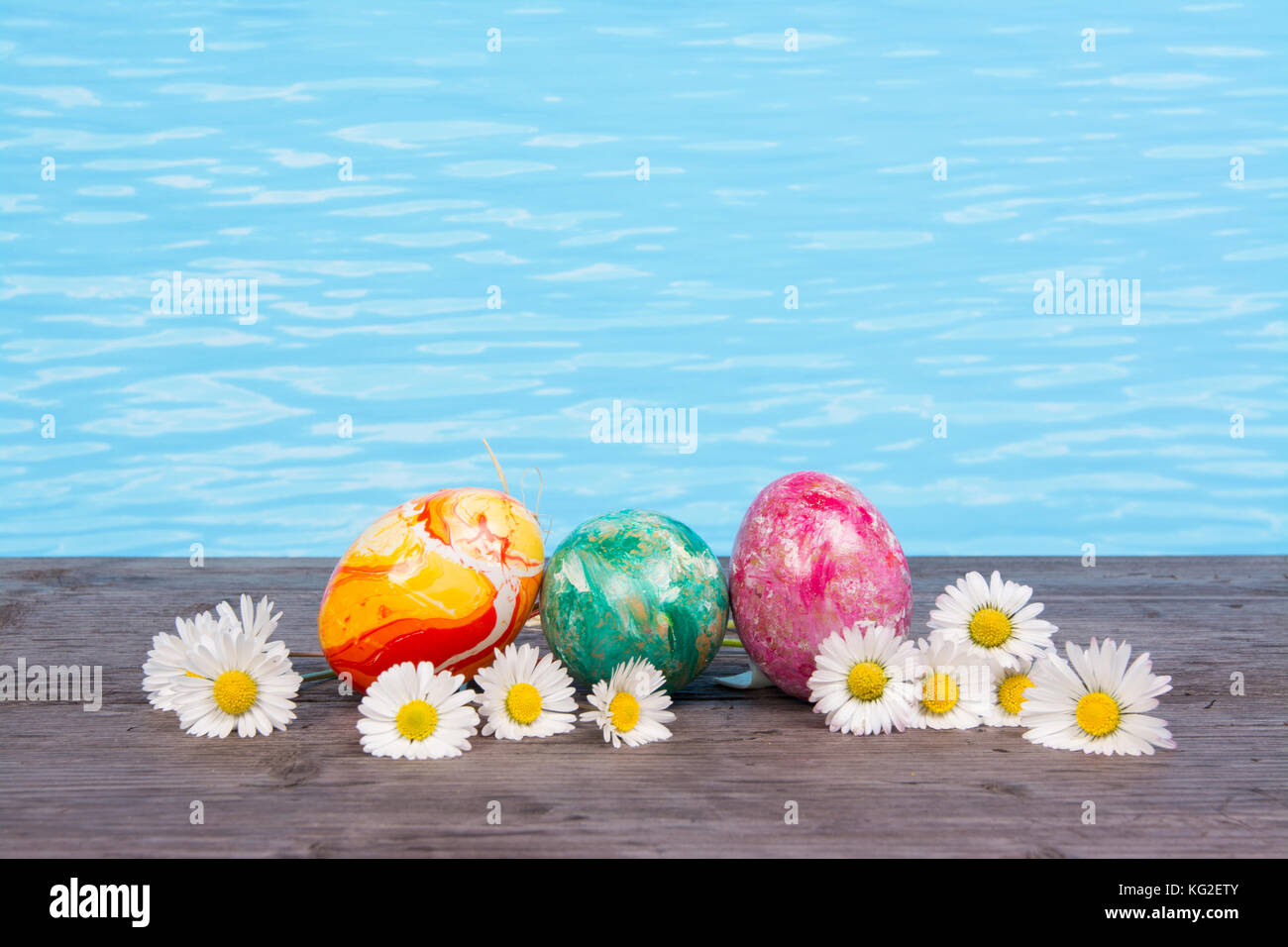 Easter in pool, wellness and relax. Eggs and water background for party ...