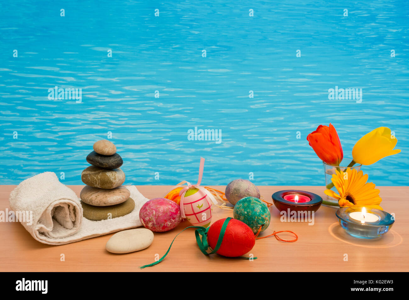 Easter in pool, wellness and relax. Eggs and water background for party ...