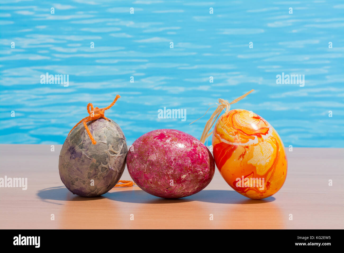 Easter in pool, wellness and relax. Eggs and water background for party ...