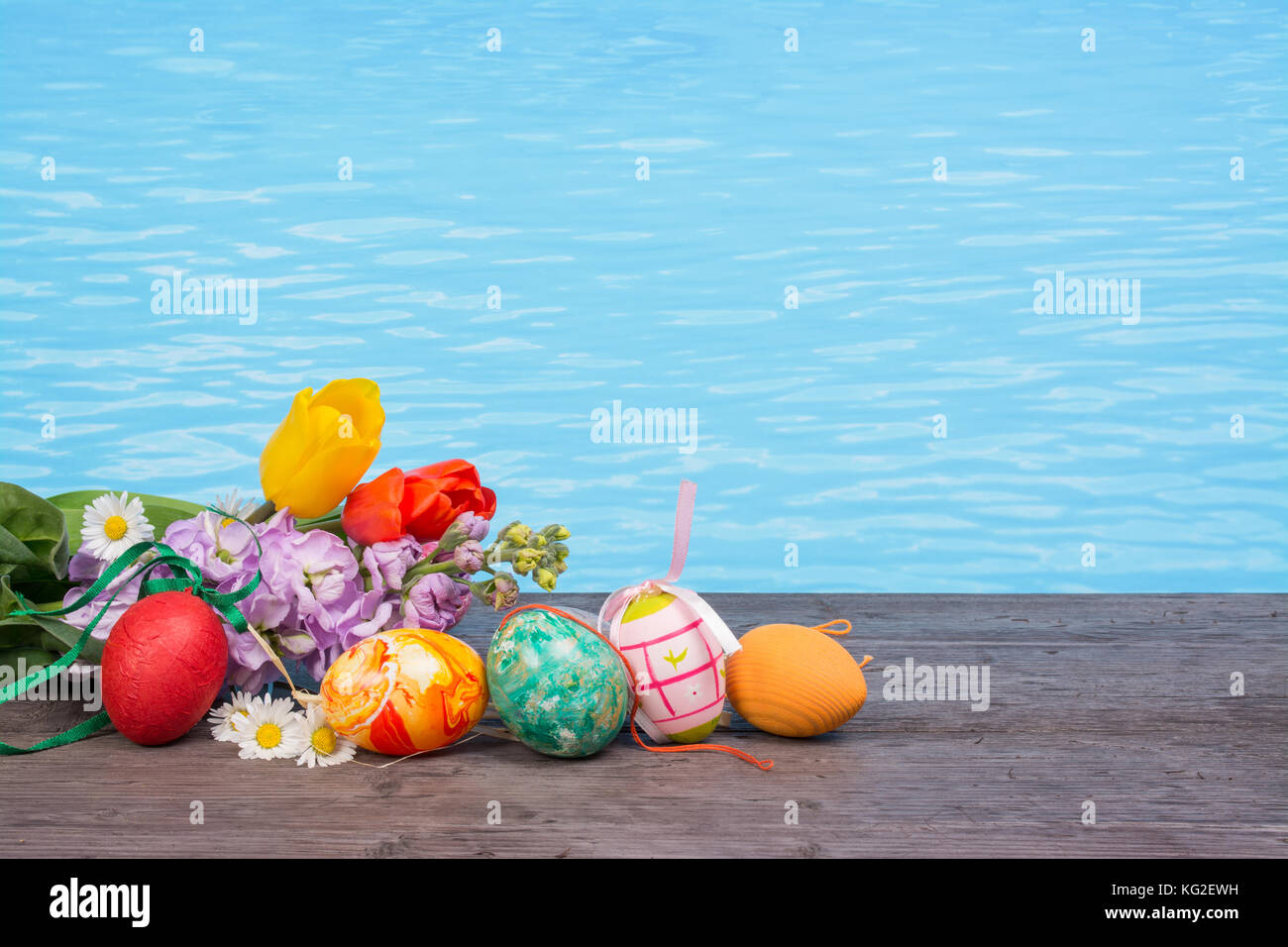 Easter in pool, wellness and relax. Eggs and water background for party ...