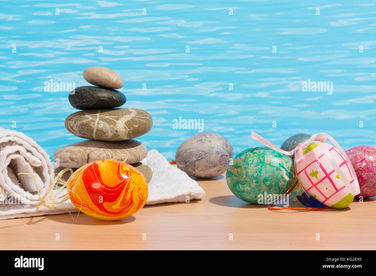 Easter in pool, wellness and relax. Eggs and water background for party ...