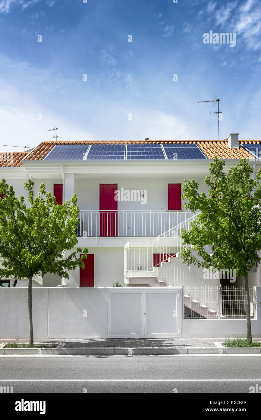 Photovoltaic solar panels on houses roof. Regenerative energy system ...