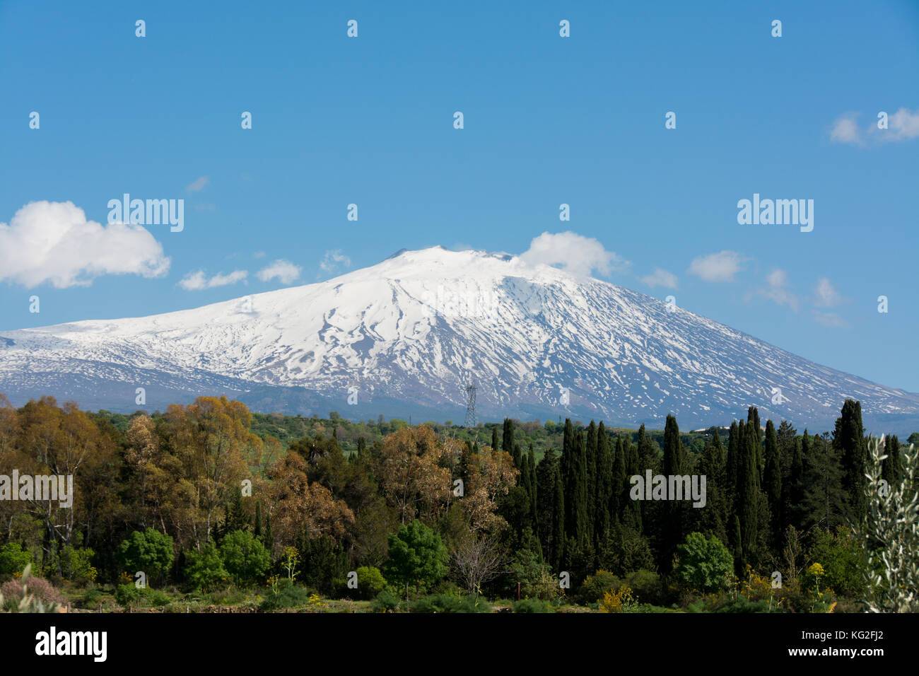 snow on mountain etna, big italian volcano, seen from the plain Stock ...