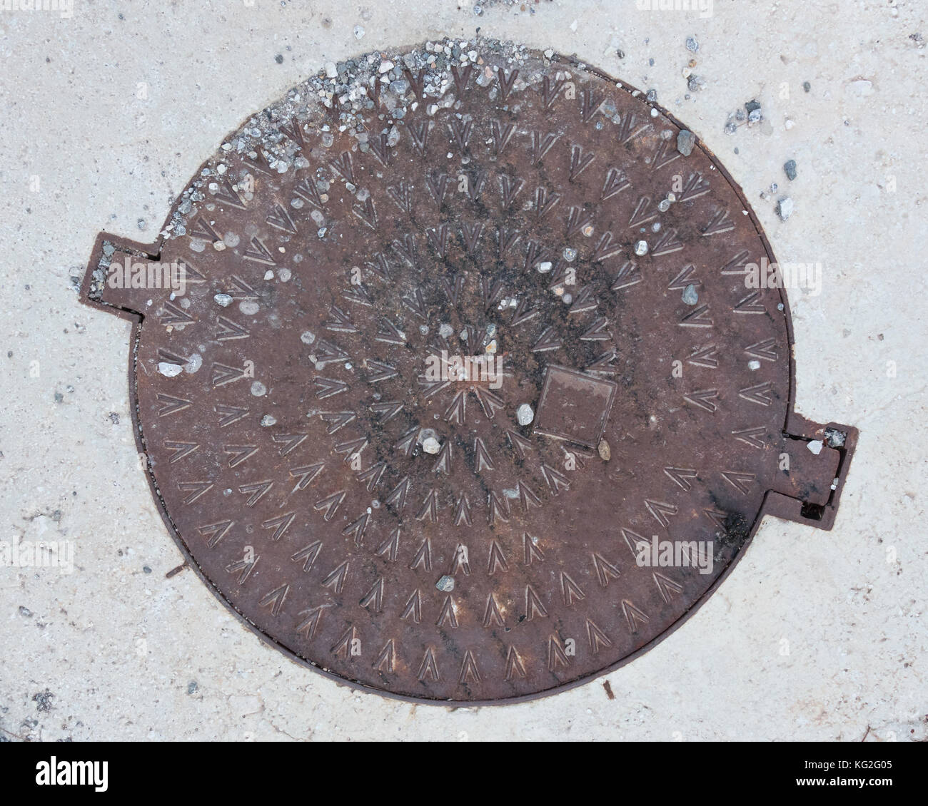 Circle steel manhole cover or metal sewer on a street in Greece Stock ...