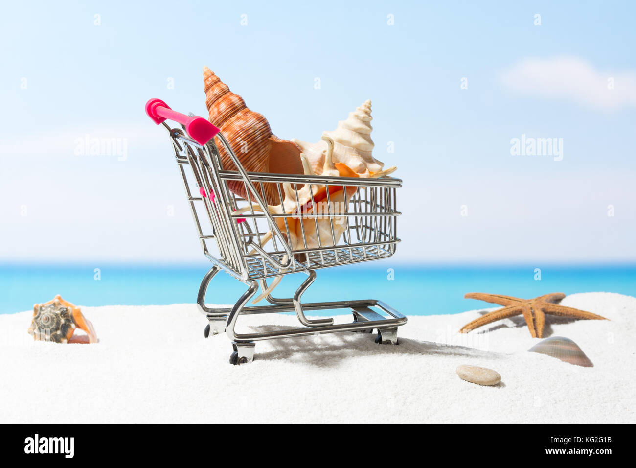 Summer shopping. Business and selling on beach. Cart on white sand ...