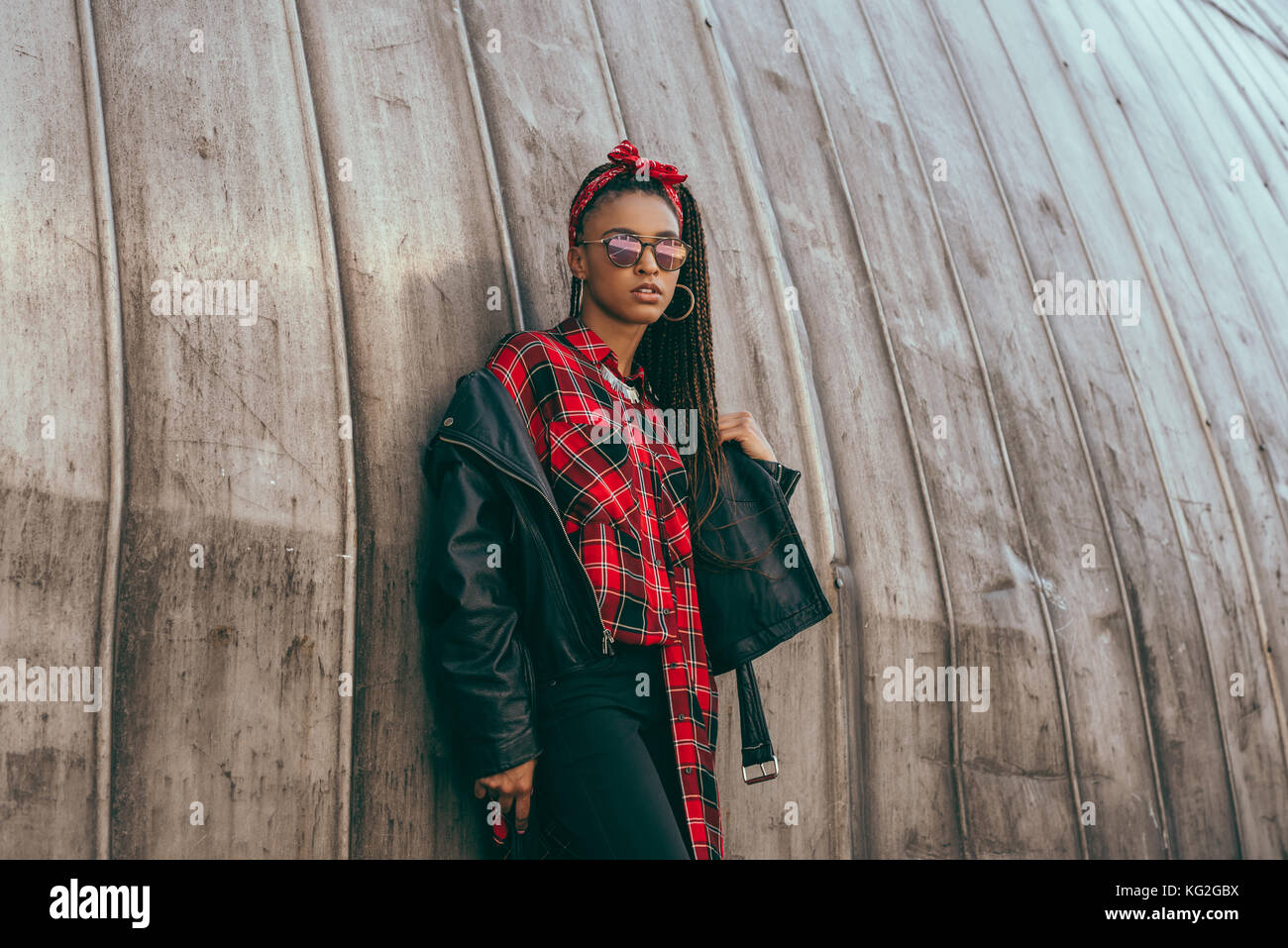 girl in leather jacket and checkered shirt Stock Photo - Alamy
