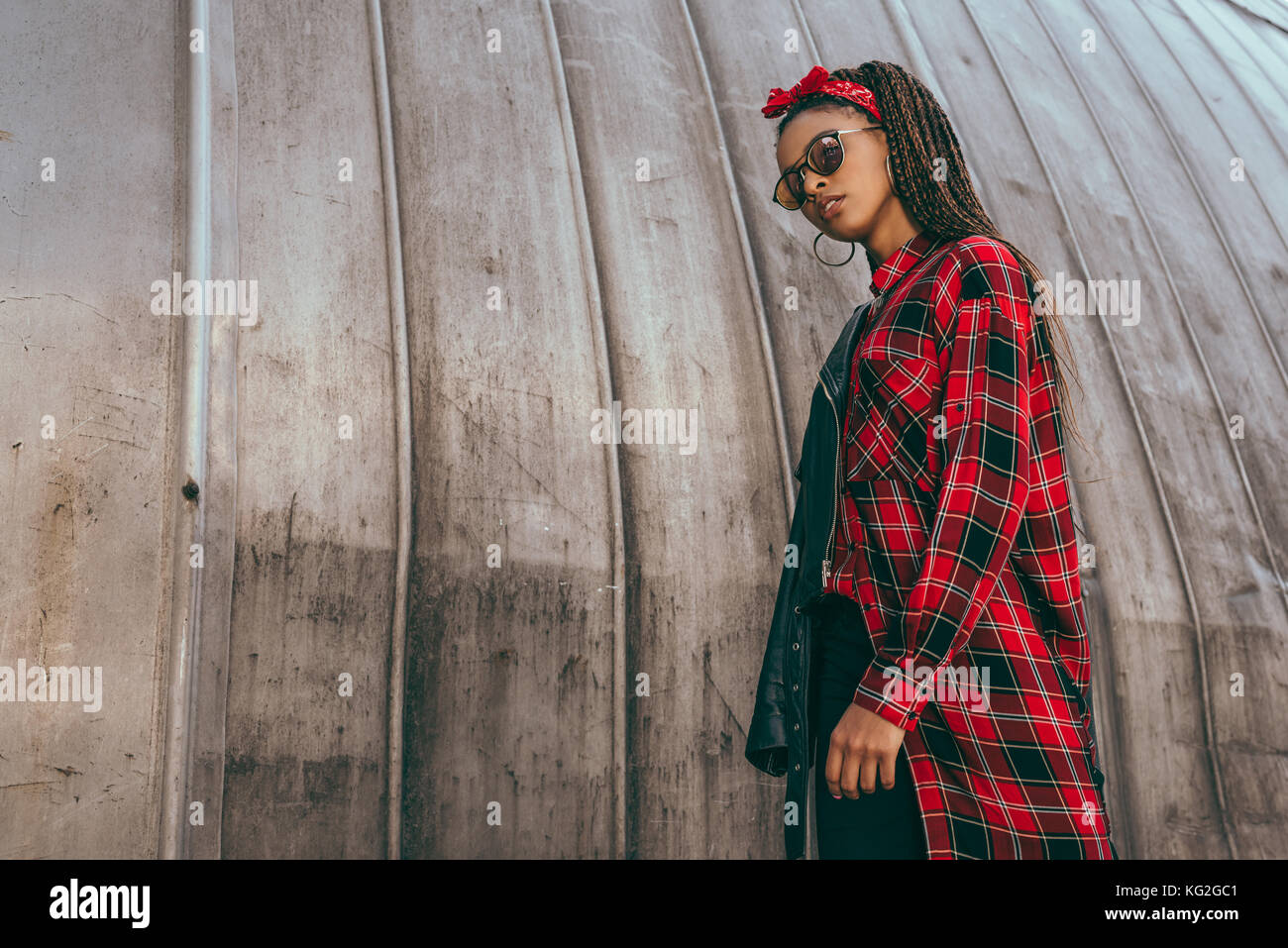 girl in leather jacket and checkered shirt Stock Photo - Alamy