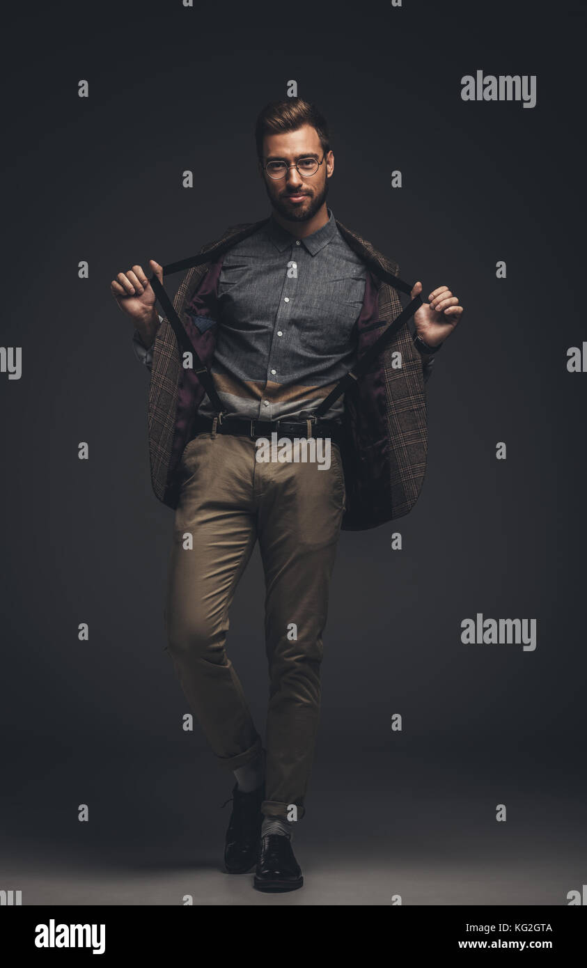 man pulling suspenders Stock Photo - Alamy