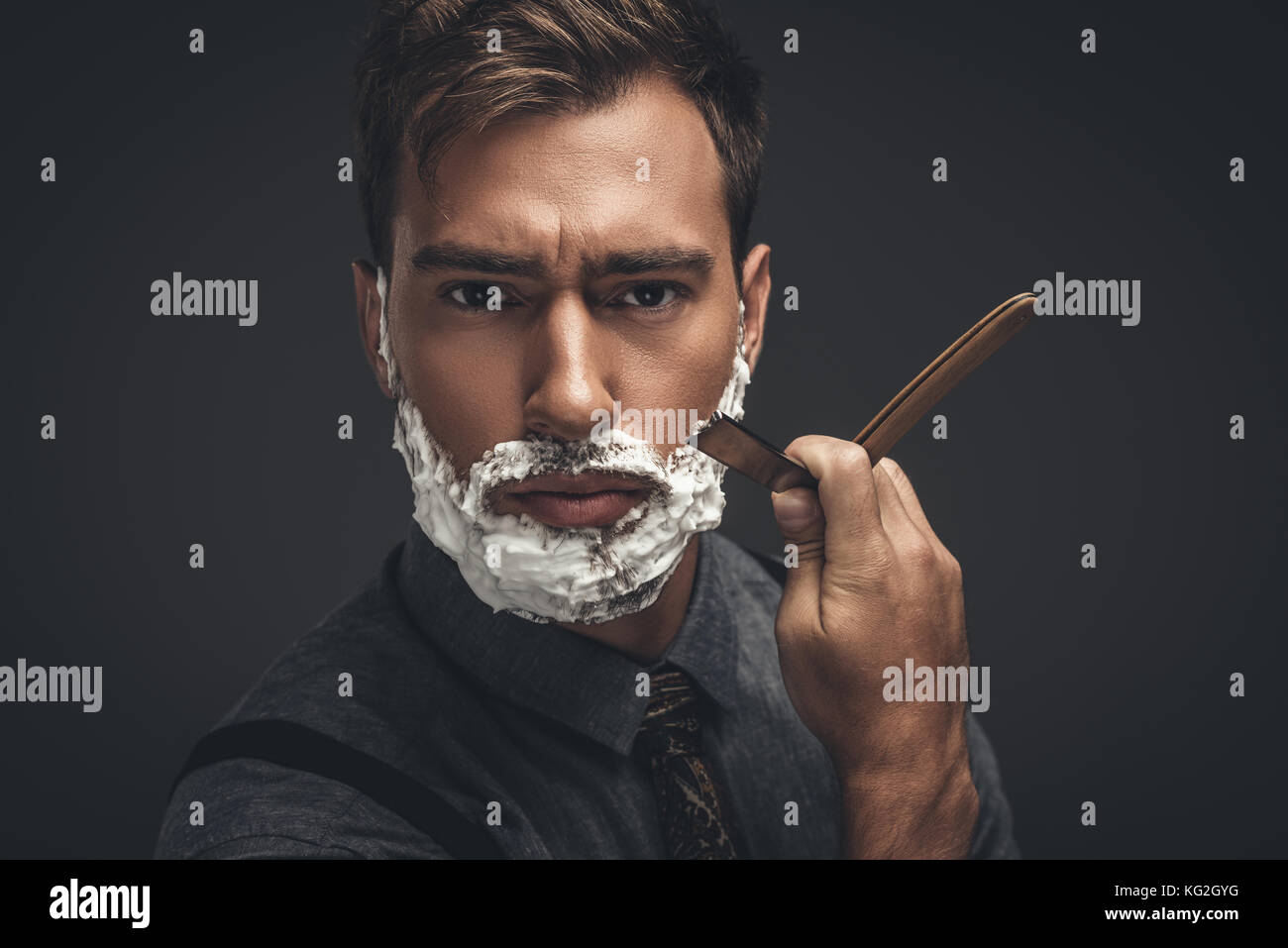 man shaving with straight razor Stock Photo - Alamy