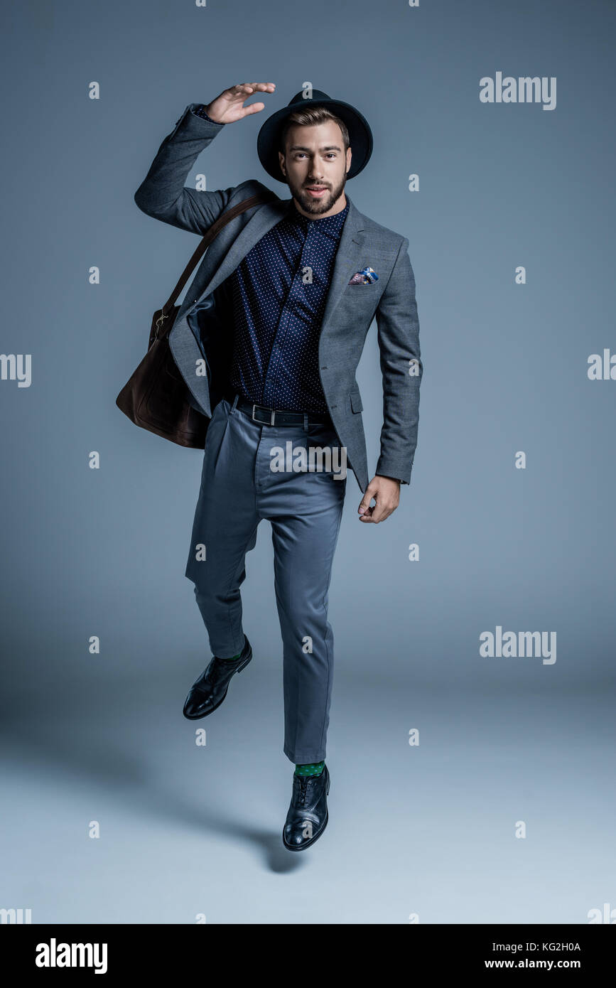 man in suit and hat walking Stock Photo - Alamy