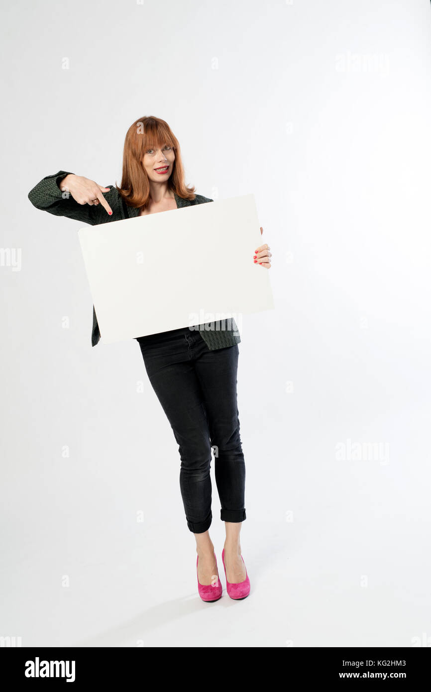 woman holding a sign Stock Photo - Alamy