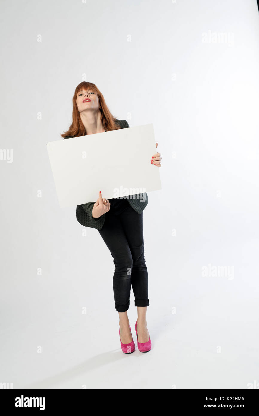 woman holding a sign Stock Photo - Alamy