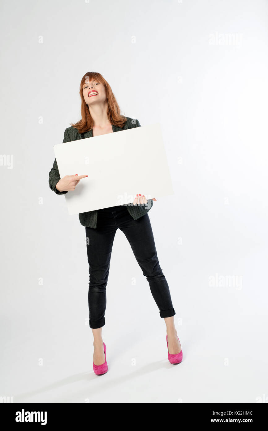 woman holding a sign Stock Photo - Alamy