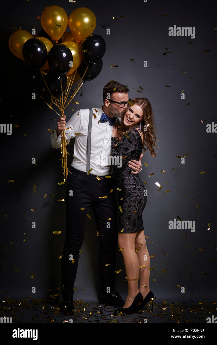 Man embrancing and kissing ecstatic woman Stock Photo - Alamy