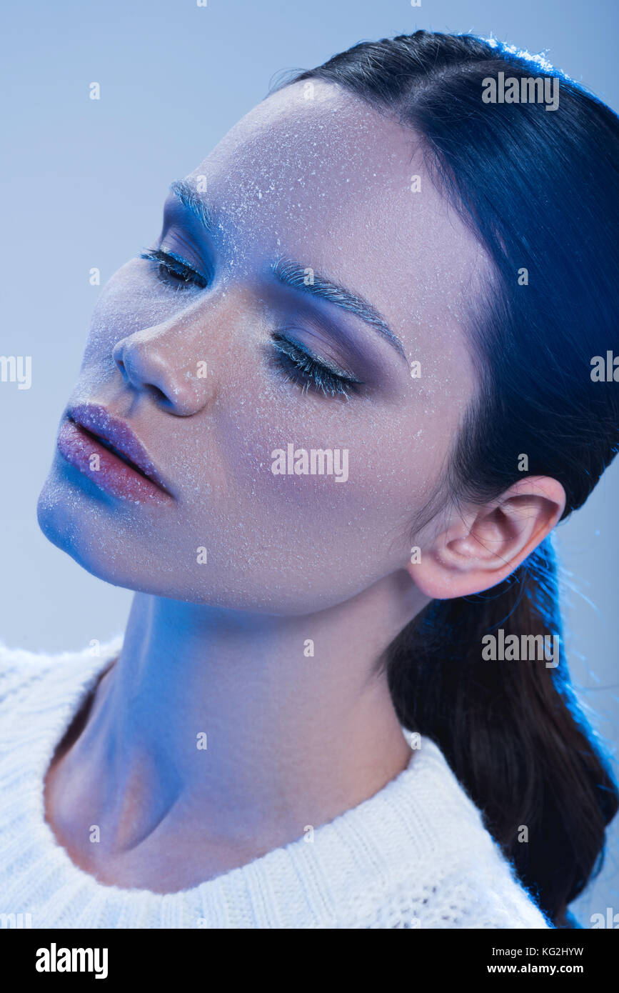 Young woman with frost on face Stock Photo - Alamy