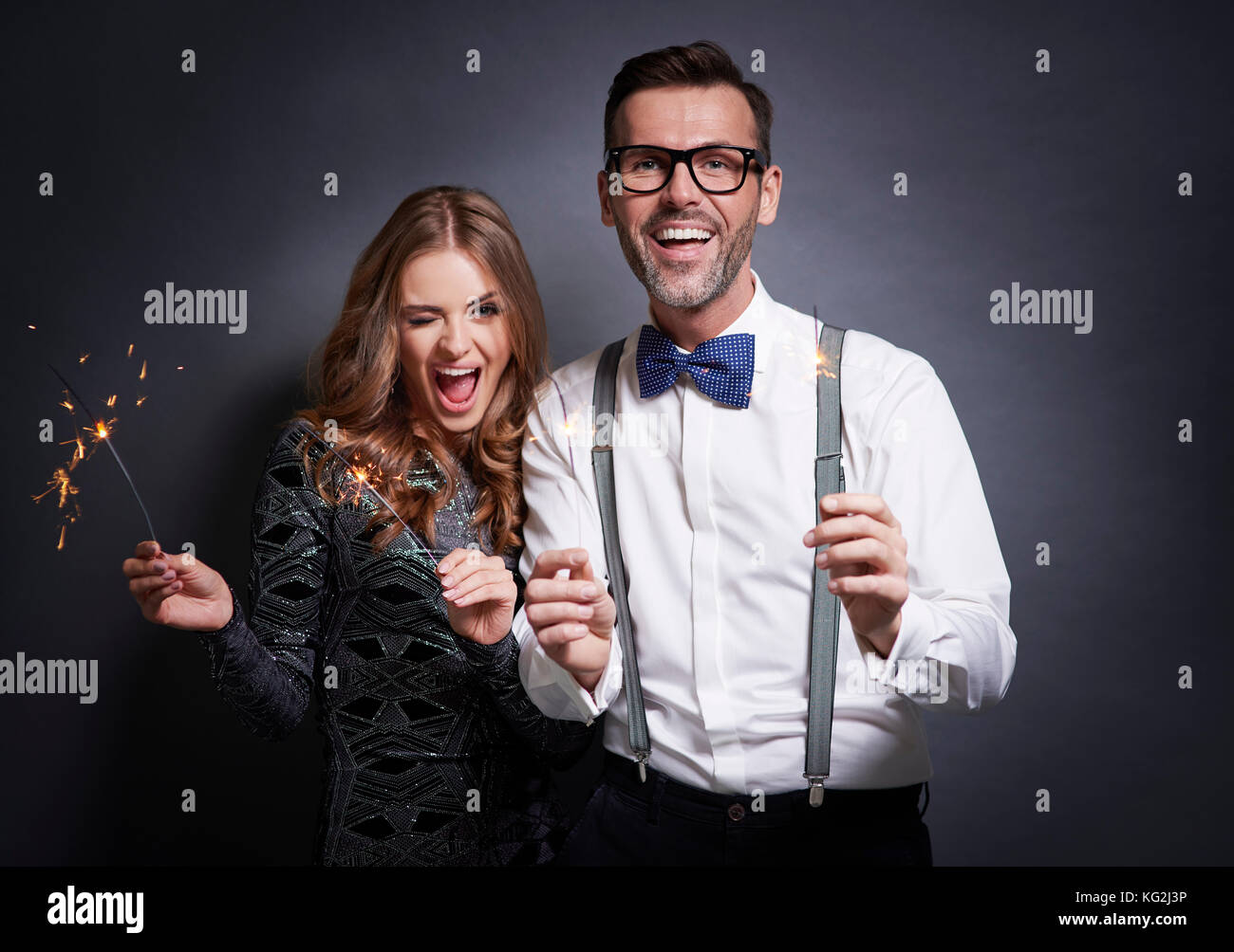 Friends sparklers enjoying party hi-res stock photography and images ...