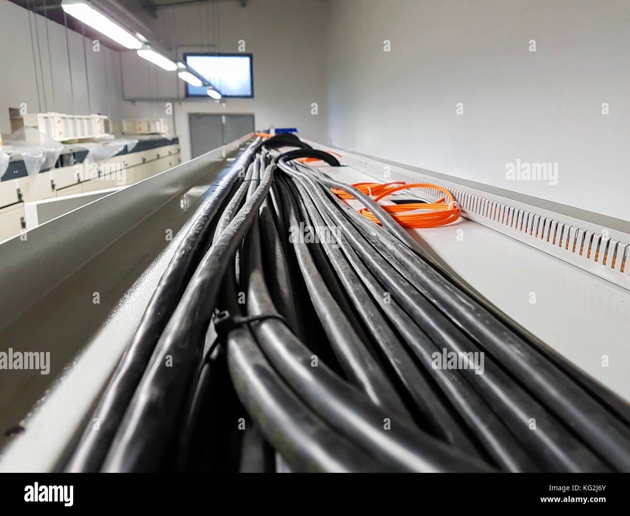 Power cables running on substation cubicles Stock Photo - Alamy